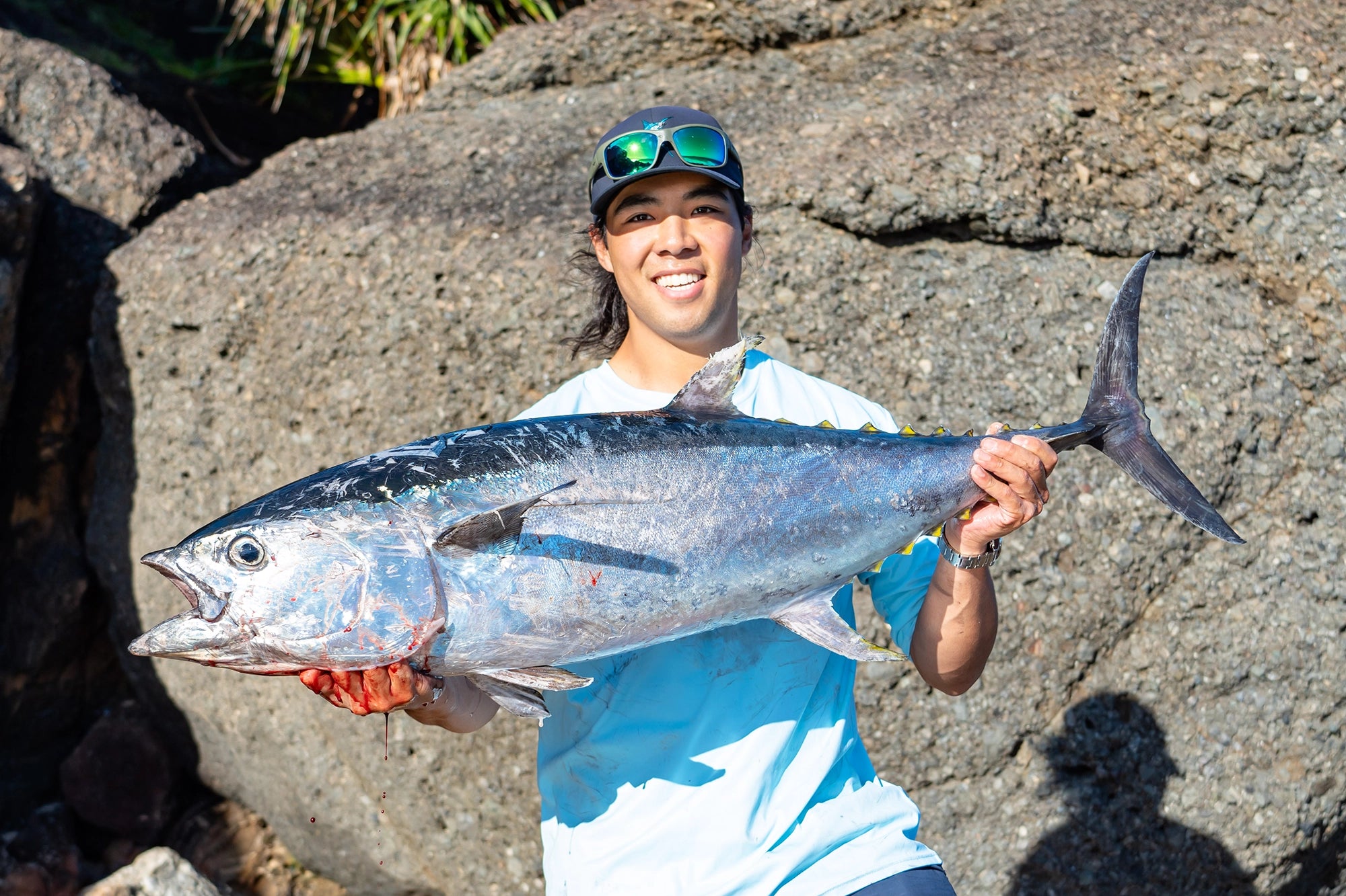 Long Tail off the Rocks – Fishing Station
